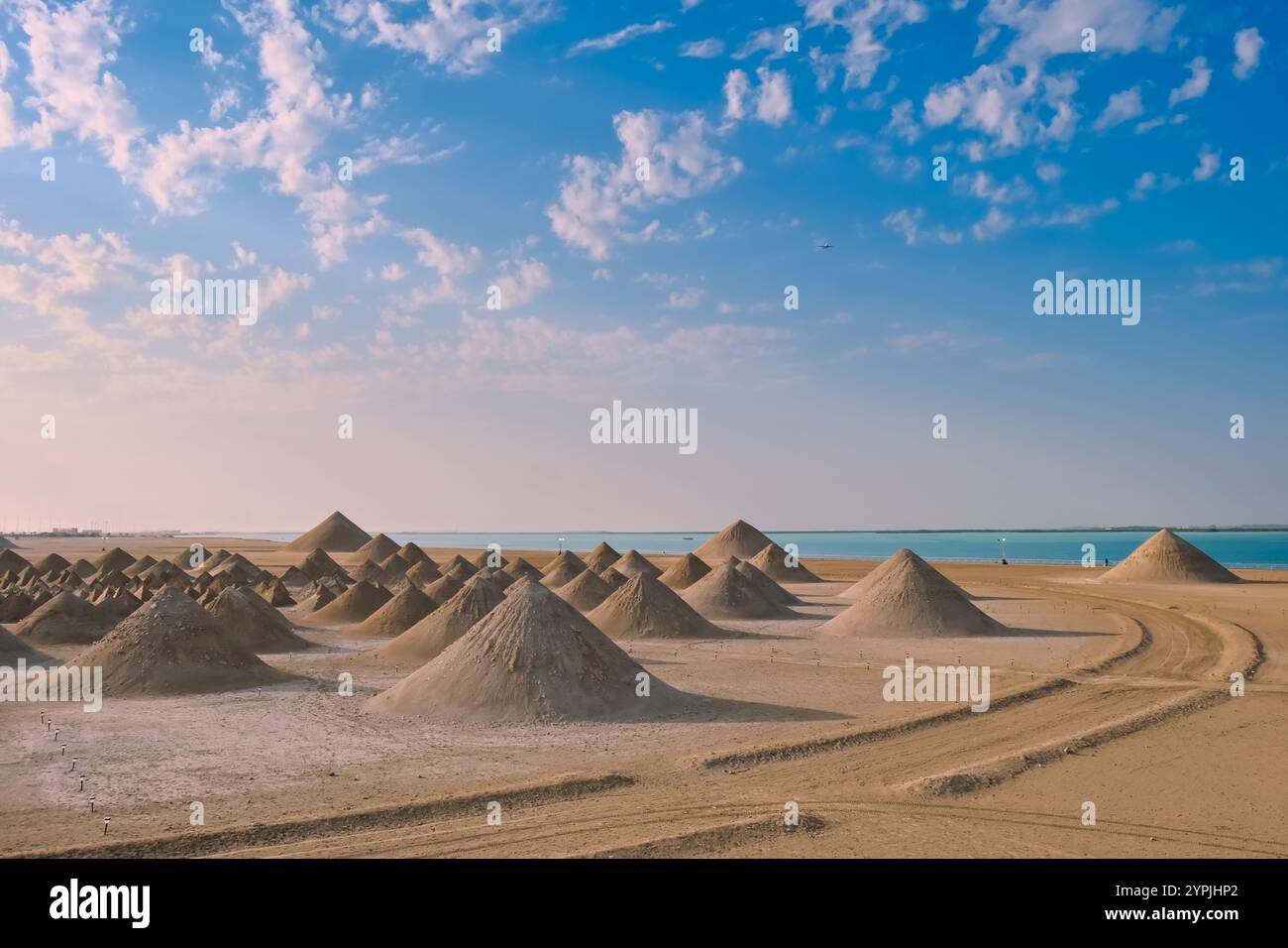 Sand mounds and pyramids on natural island Al Fahid,Abu Dhabi, future ...