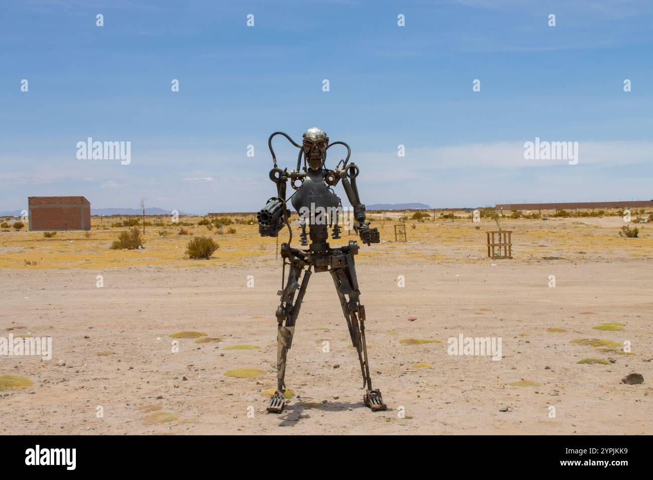 A recycled metal sculpture of a humanoid robot with intricate details ...