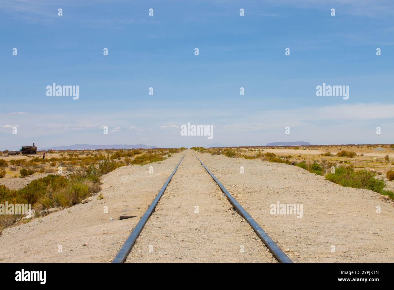 An old, weathered train track leading into the vast desert at the Train ...