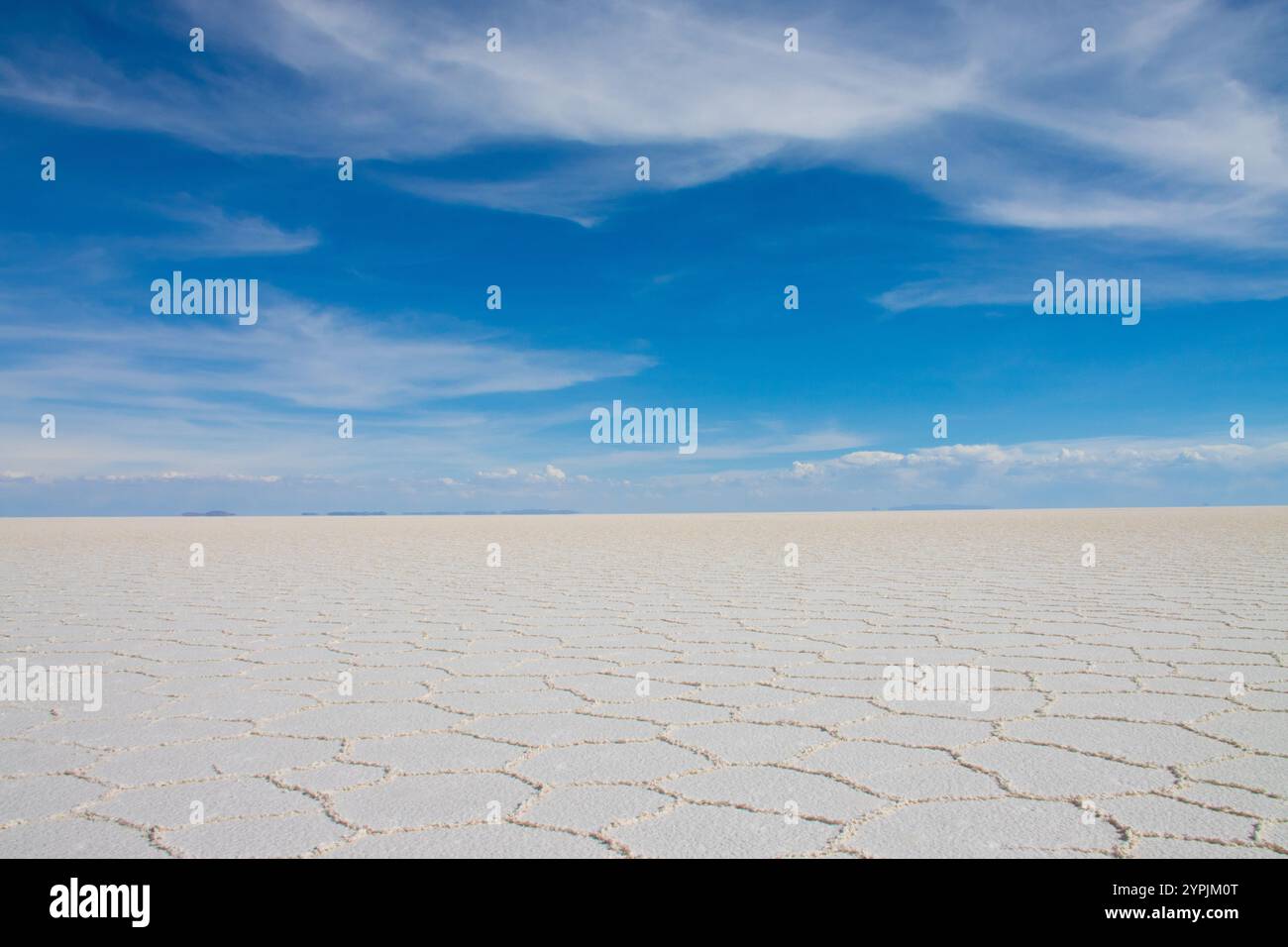 Expansive view of the pristine white salt flats of Salar de Uyuni under ...