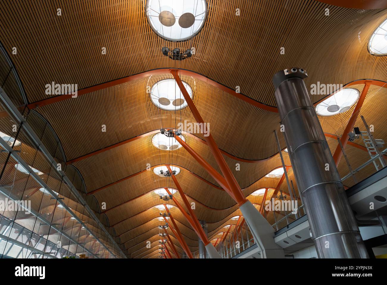 Undulating bamboo ceiling of Terminal T4s at Madrid-Barajas Airport in ...