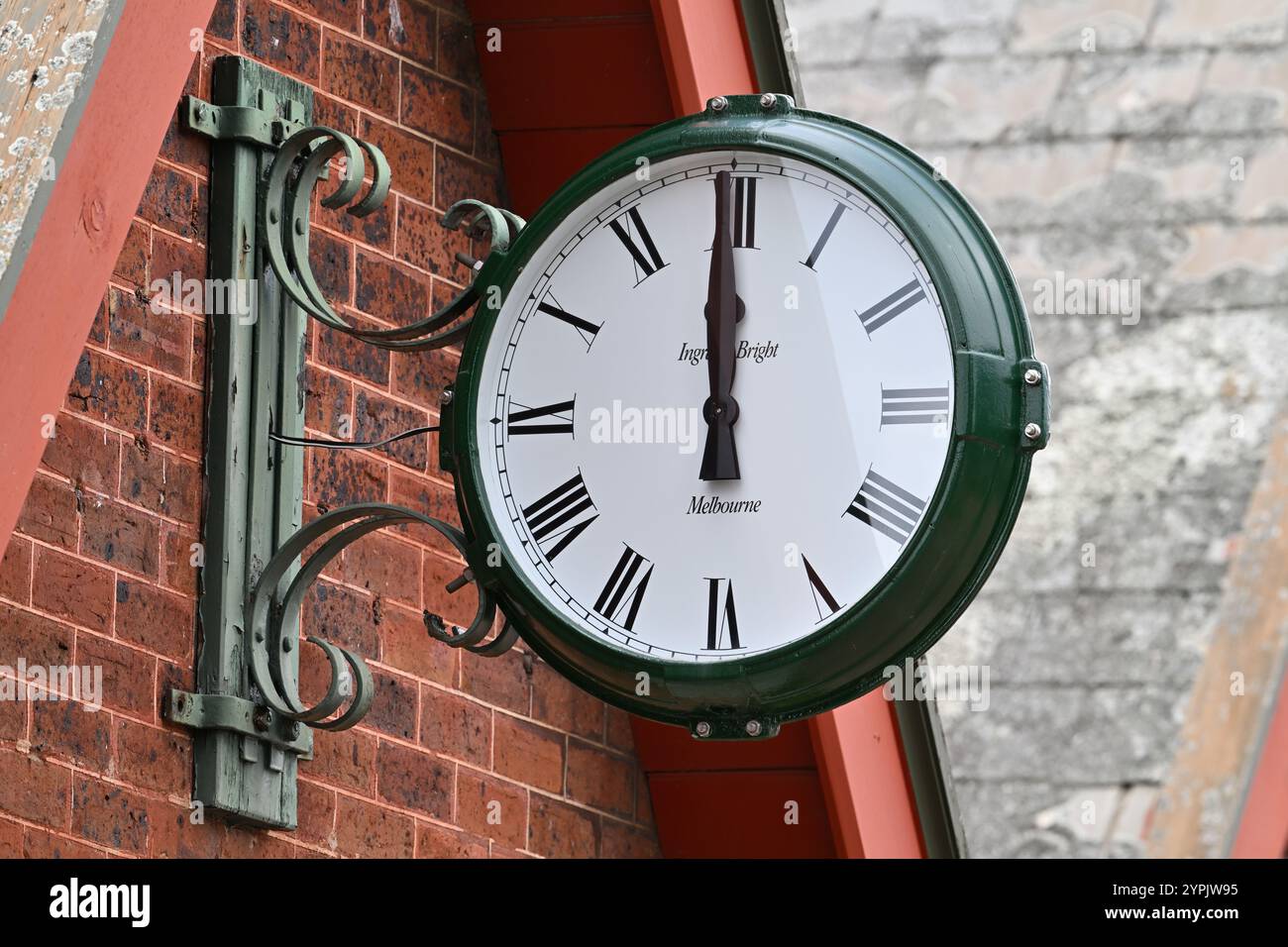 Green Ingrams Bright analogue clock, featuring white face and black ...