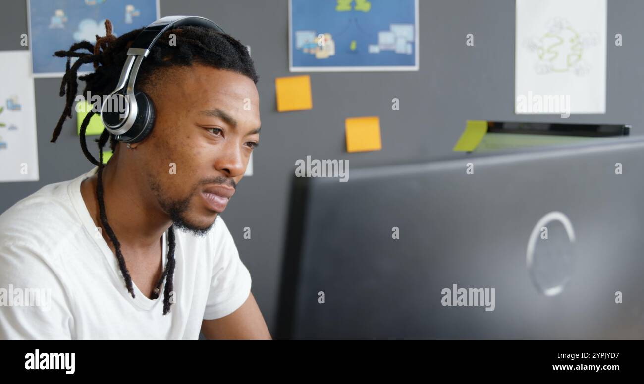 Attentive male executive working on computer in office Stock Photo - Alamy