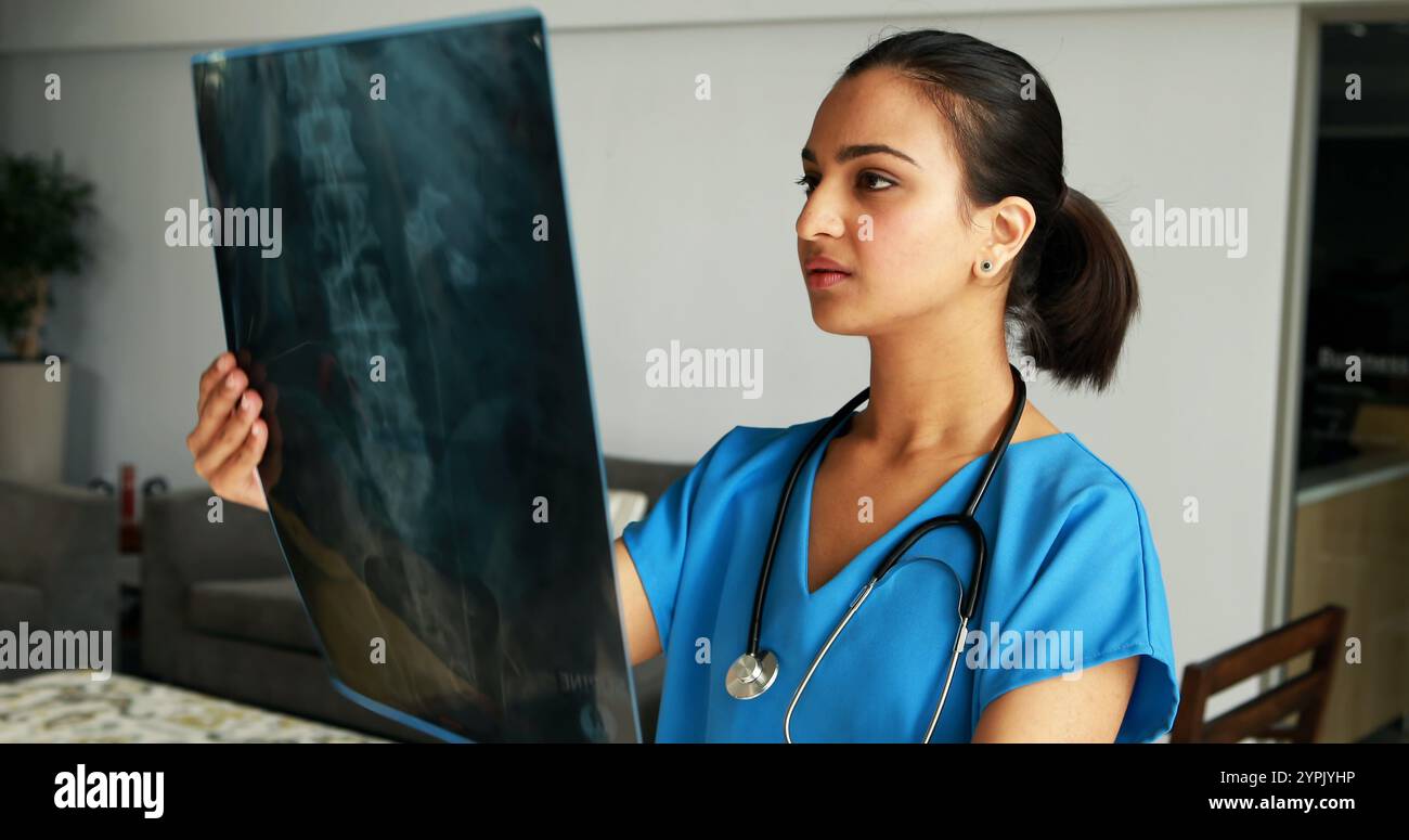 Doctor examining woman in medical hi-res stock photography and images ...