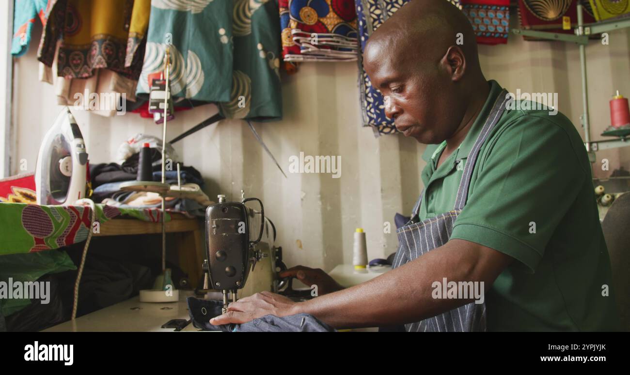 Craftsman using sewing machine in hi-res stock photography and images ...