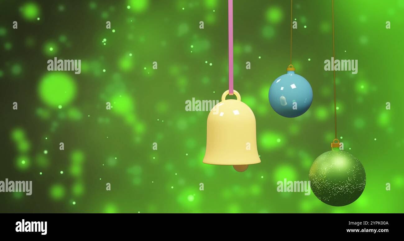 Image of christmas baubles and bell over snow falling on green ...