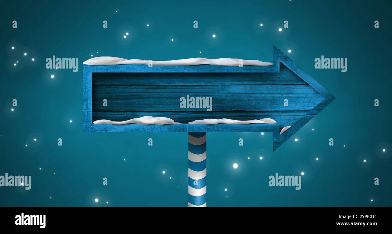 Image of blue arrow sign spots of light falling on blue background ...