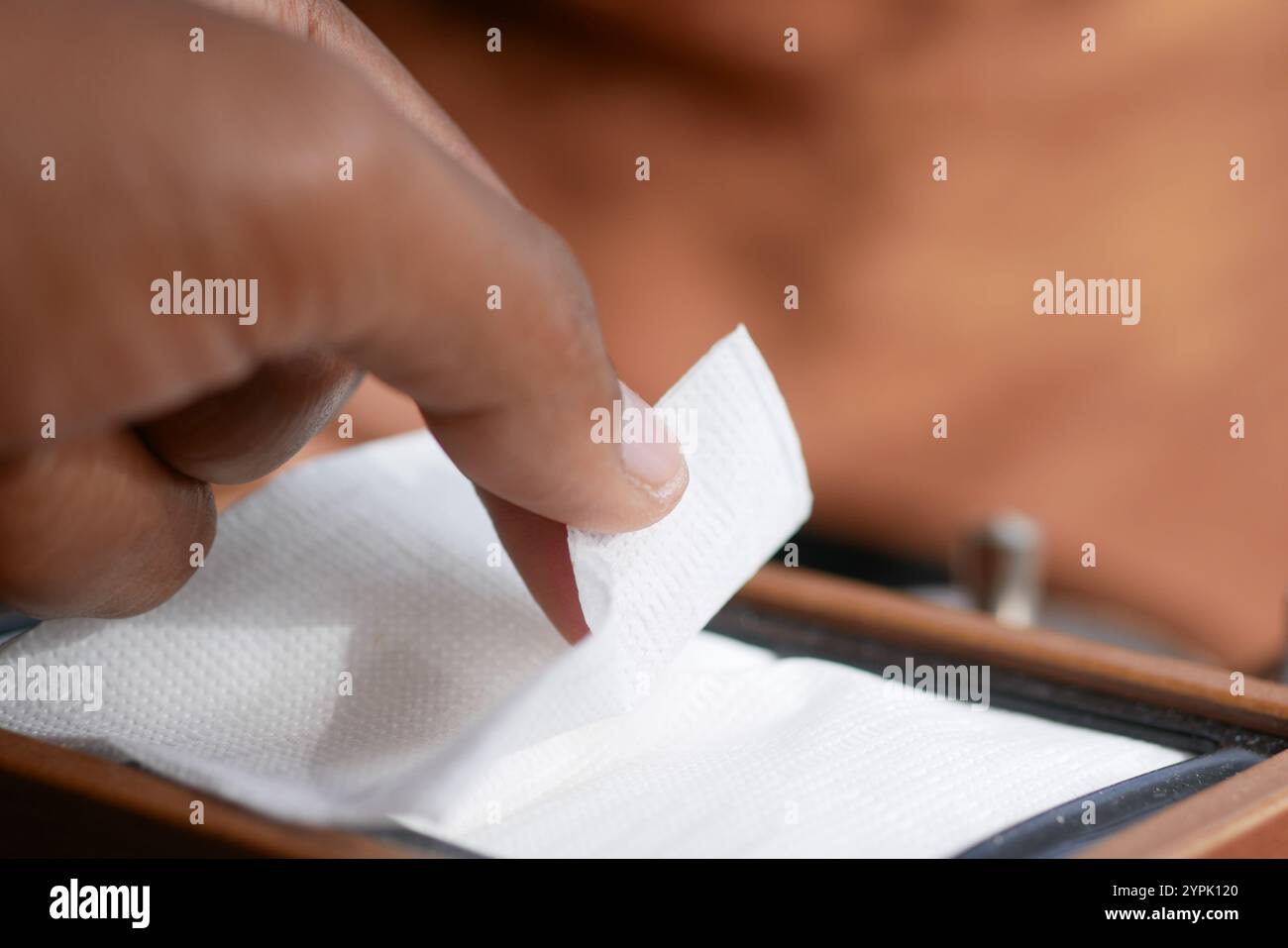hand pull out a piece of tissue from tissue paper box Stock Photo - Alamy