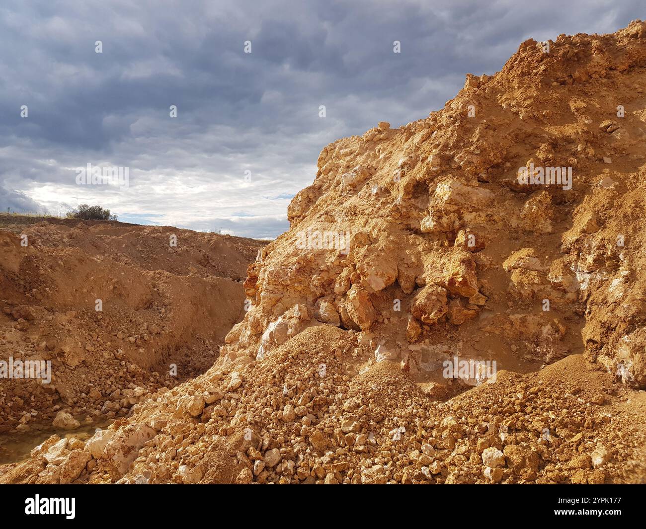 View of a small stone quarry for the extraction of limestone aggregate ...