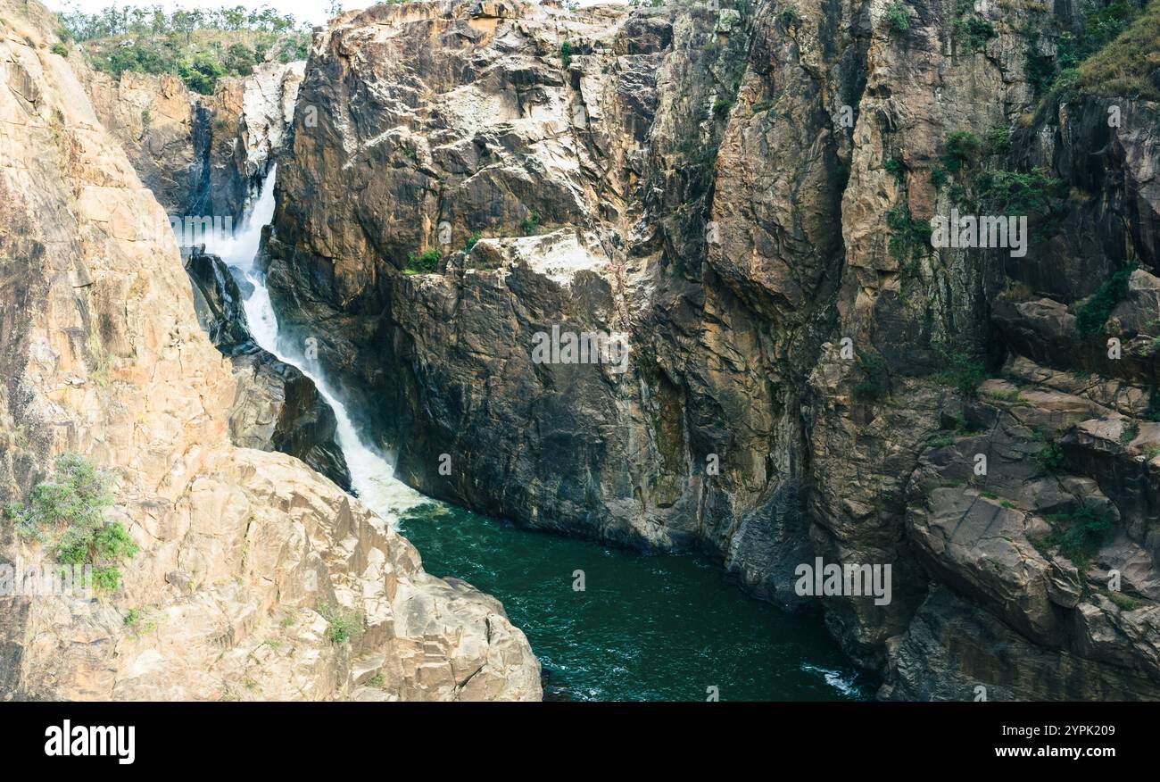 Waterfall over the side of a gorge into the Herbert River Stock Photo ...