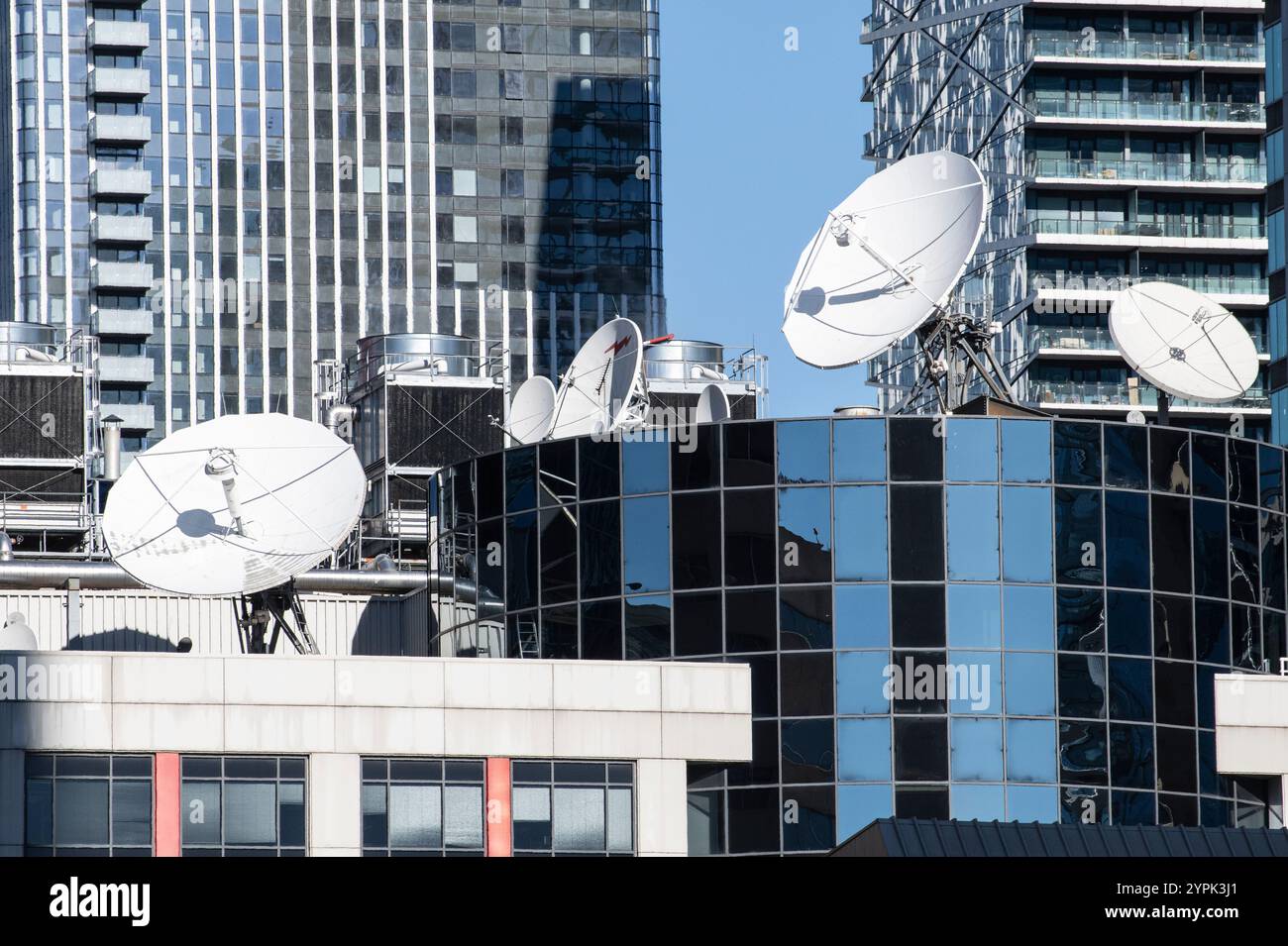 Satellite dishes on top of buildings in downtown Toronto, Ontario ...