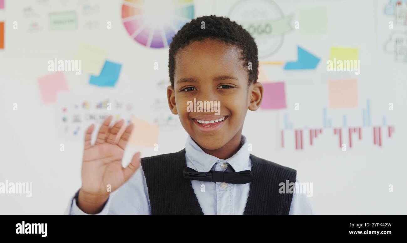Portrait of kid as business executive gesturing in office Stock Photo ...