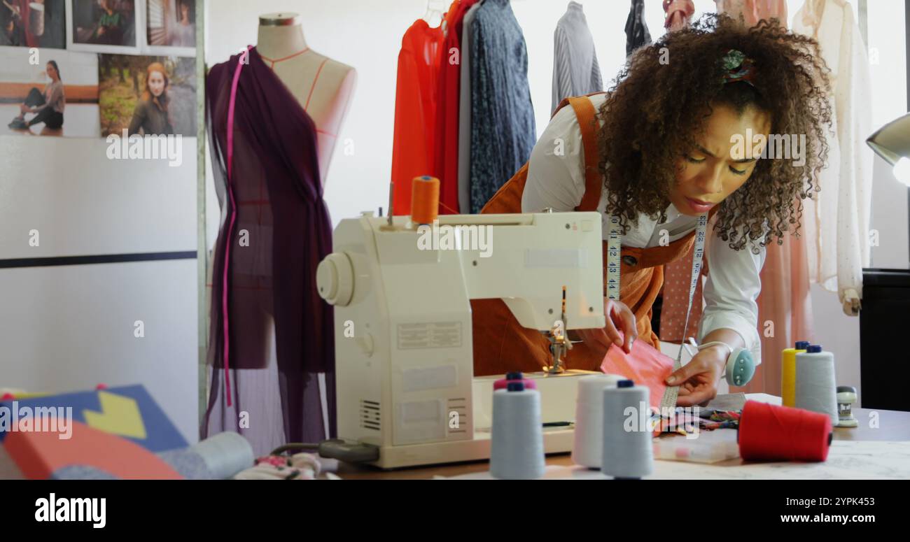 Professional designer examining samples hi-res stock photography and ...