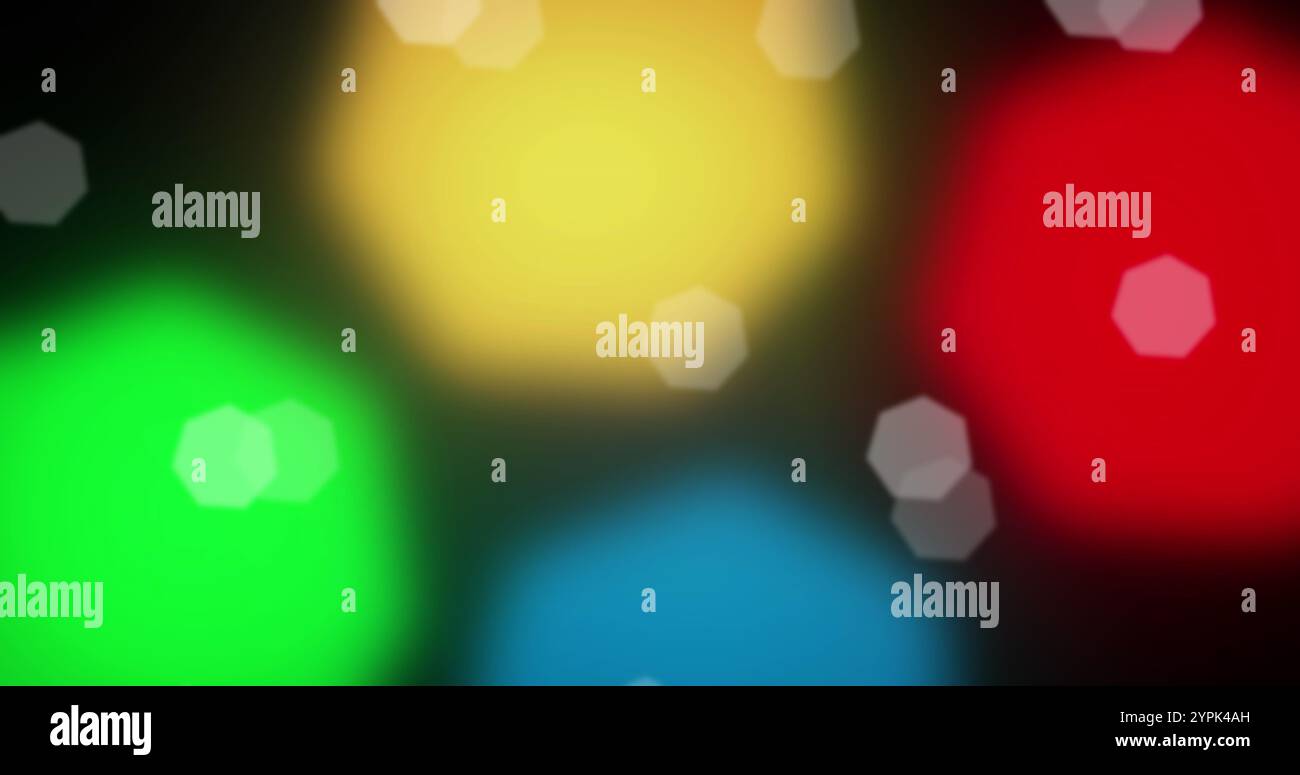 Image of spots falling over multi coloured spots on black background ...