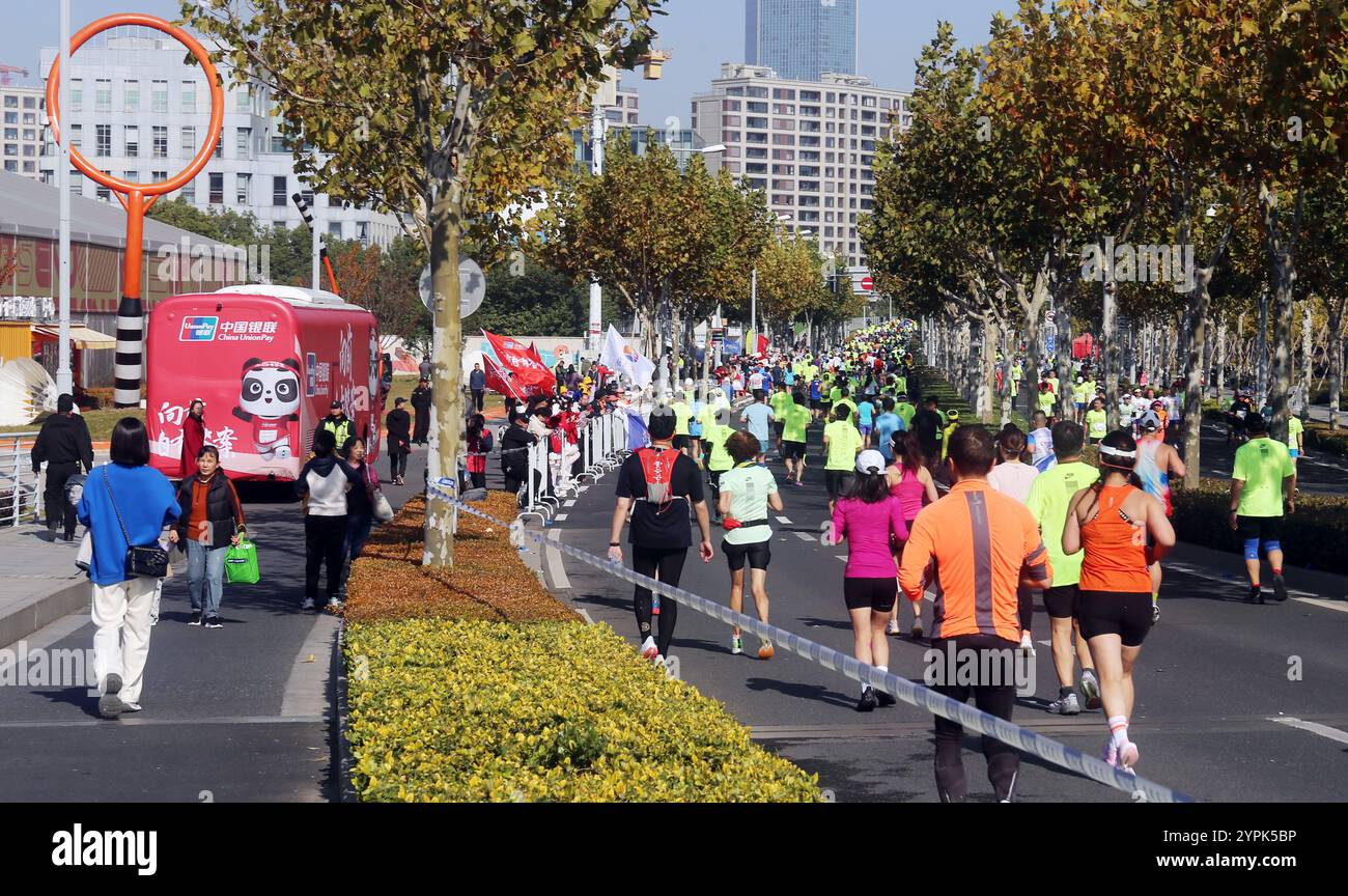 SHANGHAI, CHINA - DECEMBER 1, 2024 - Runners take part in the Shanghai ...