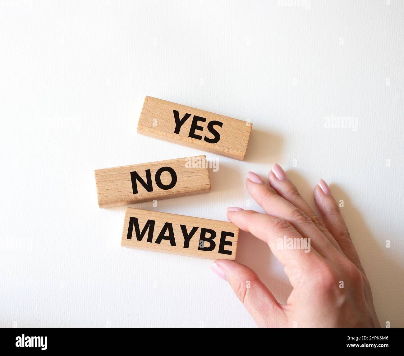 Yes No Maybe symbol. Concept word Yes No Maybe on wooden blocks ...
