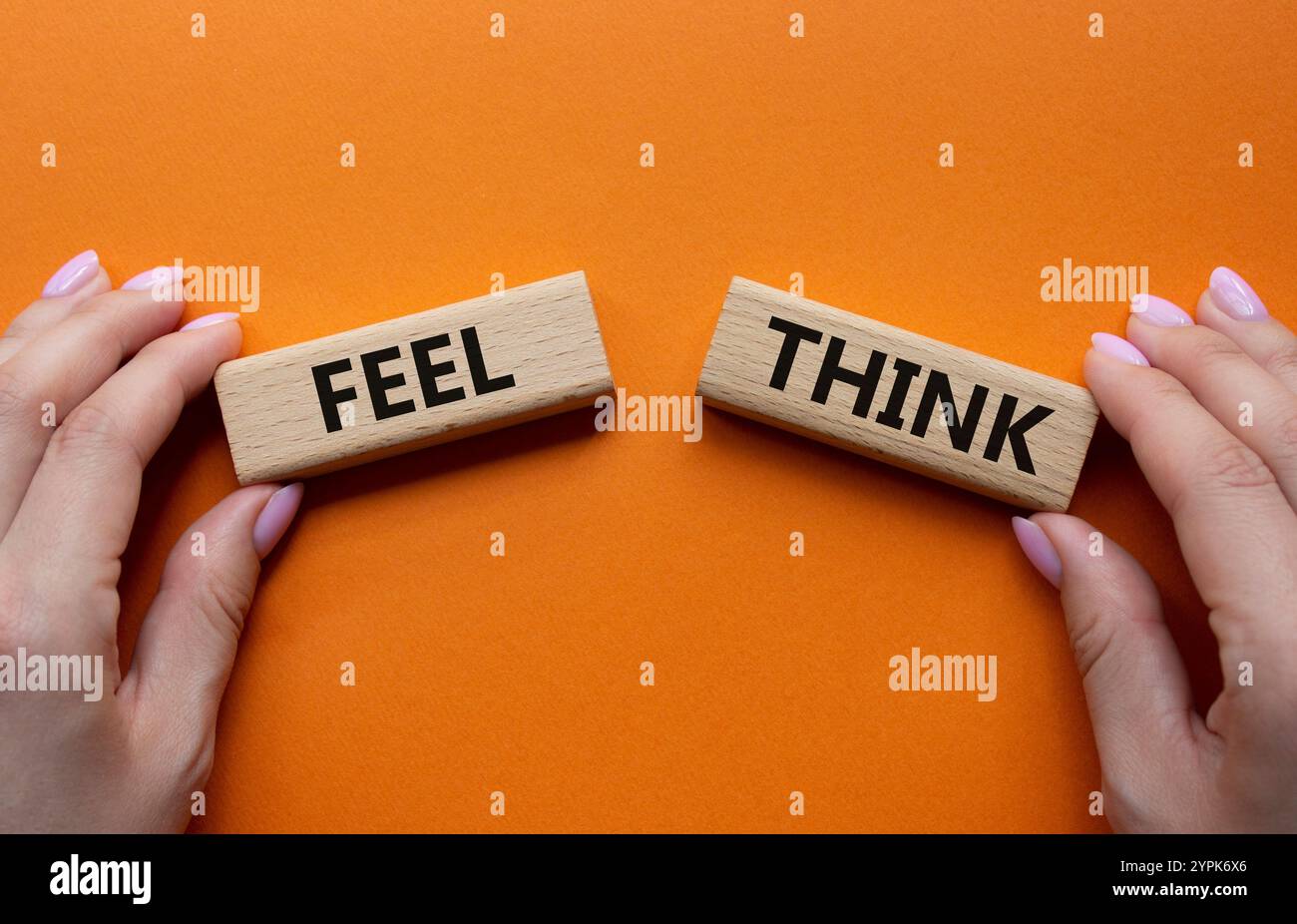 Think or Feel symbol. Concept word Think or Feel on wooden blocks ...
