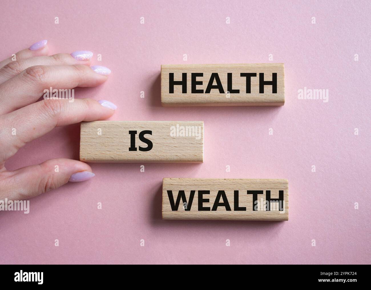 Health is Wealth symbol. Concept word Health is Wealth on wooden blocks ...