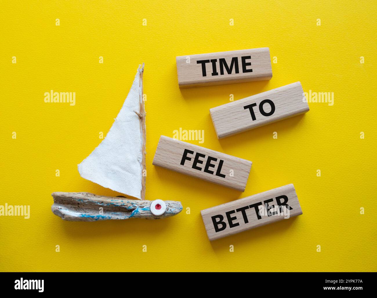 Time to feel better symbol. Wooden blocks with words Time to feel ...