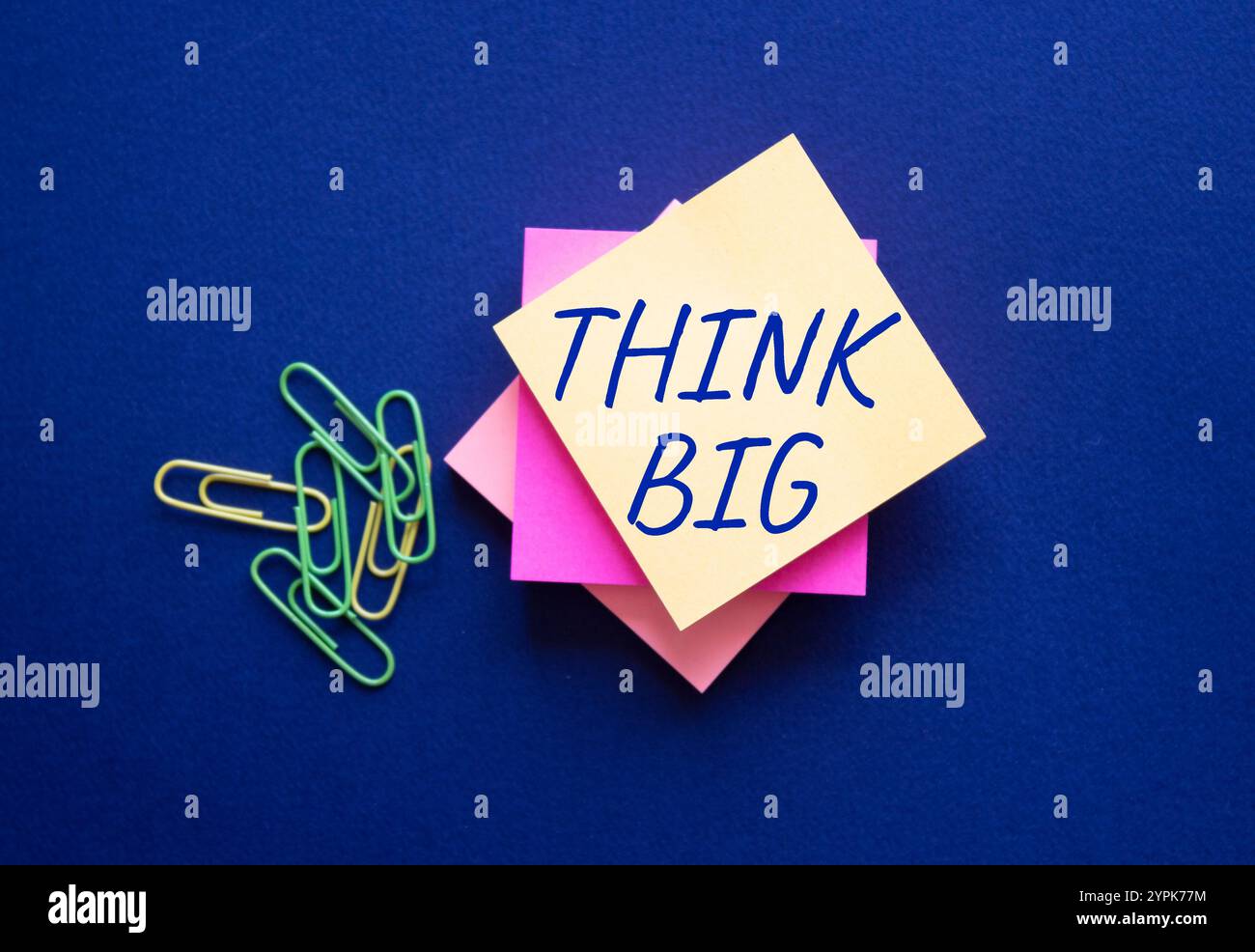 Think big symbol. Orange steaky note with words Think Big. Beautiful ...