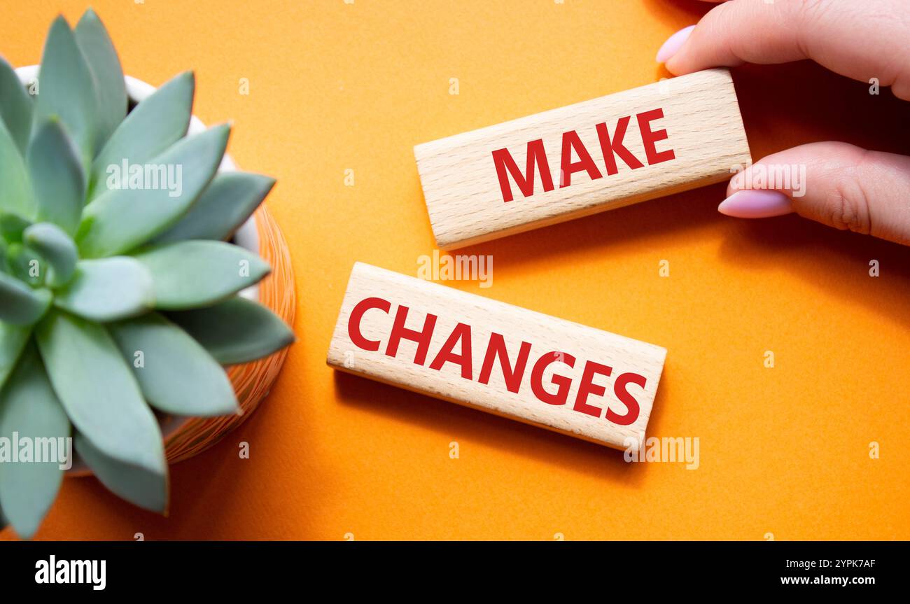 Make changes symbol. Wooden blocks with words Make changes with ...