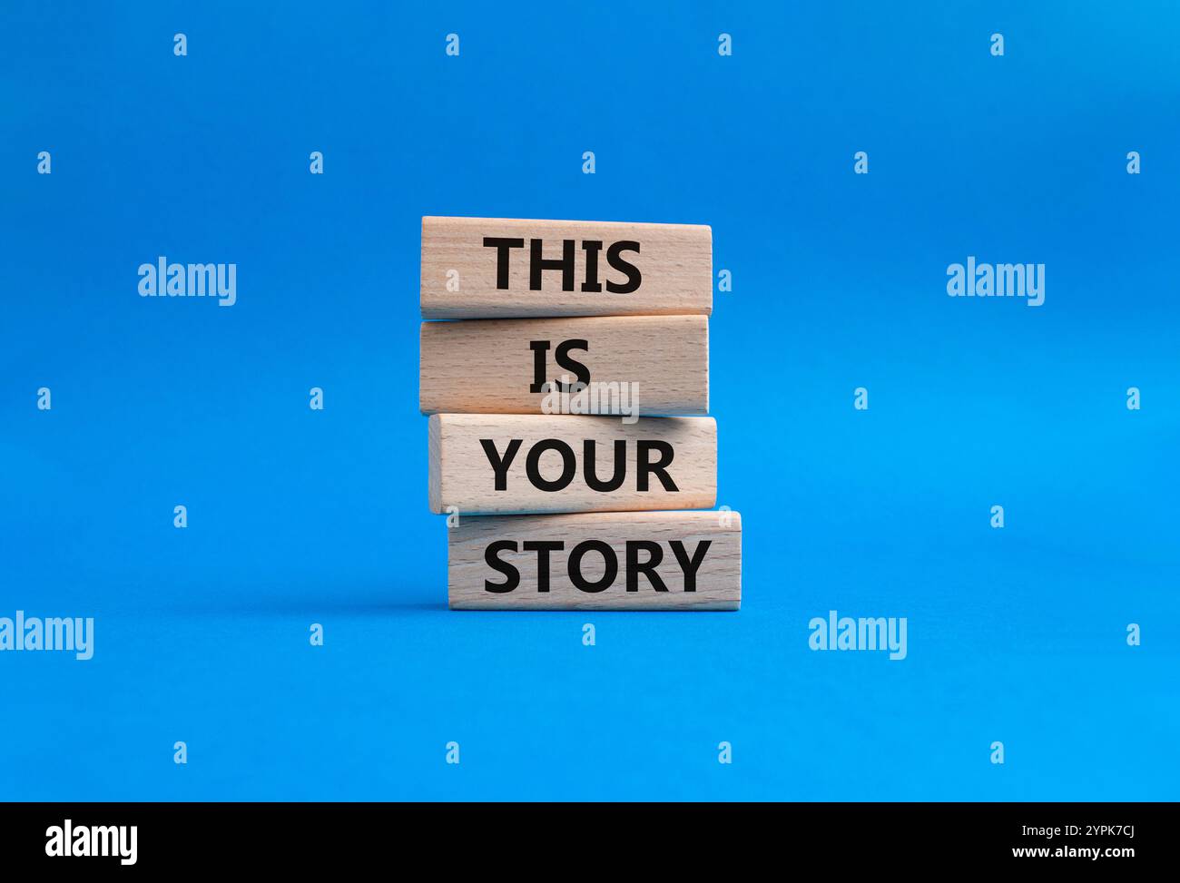 This is your Story symbol. Wooden blocks with words This is your Story ...