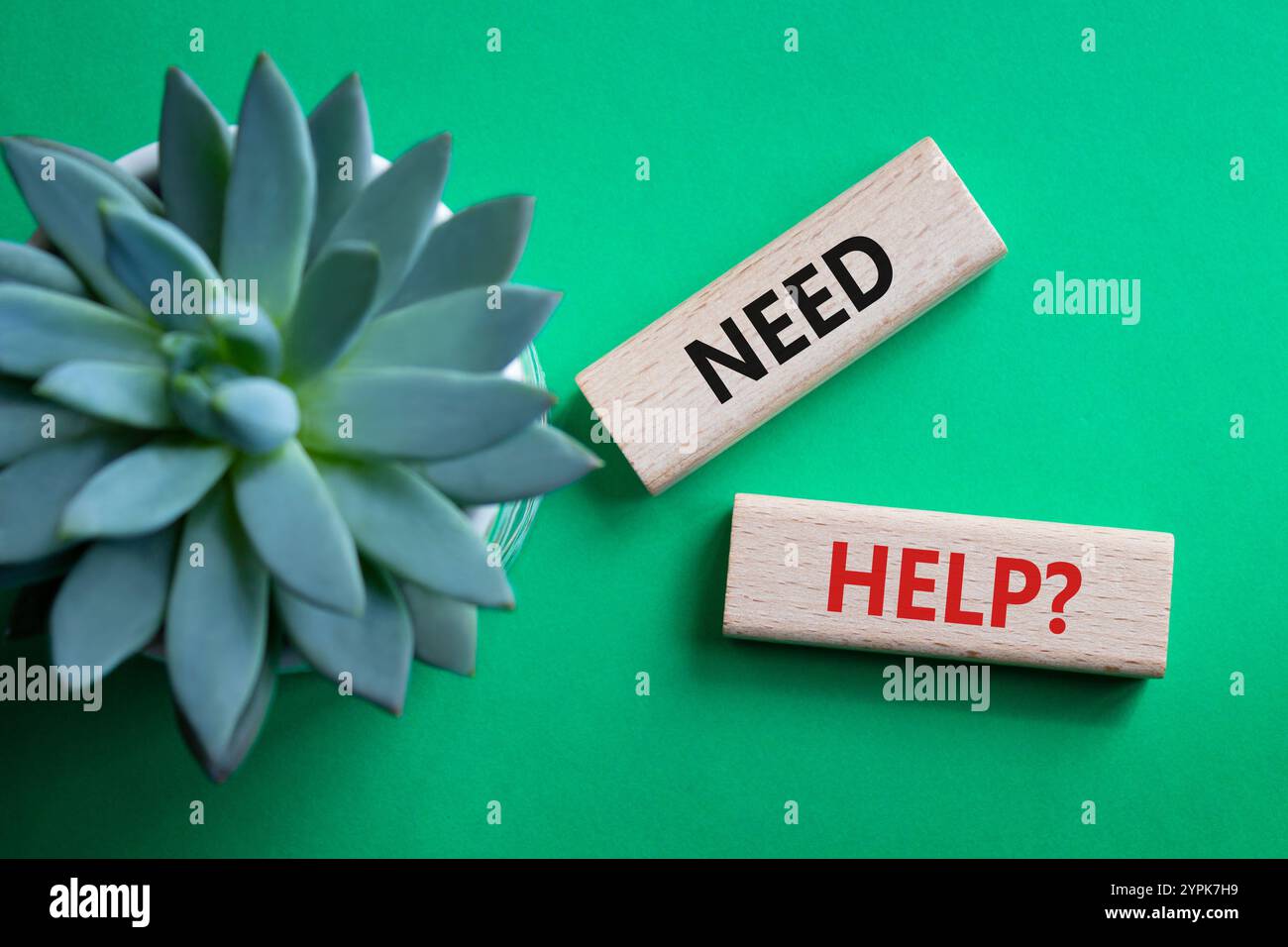 Need Help symbol. Concept word Need Help on wooden blocks. Beautiful ...