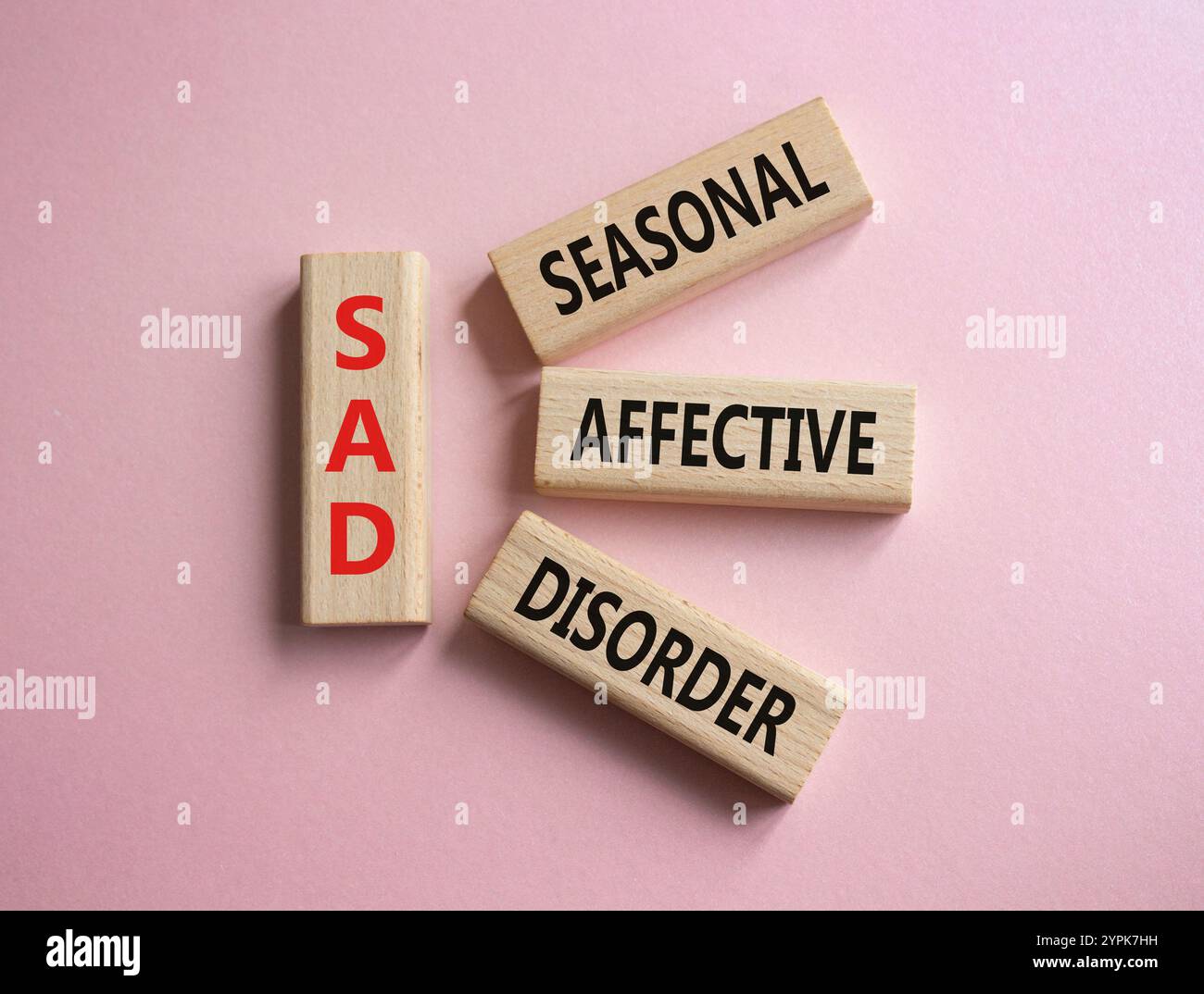 Sad - Seasonal Affective Disorder symbol. Wooden blocks with words Sad ...