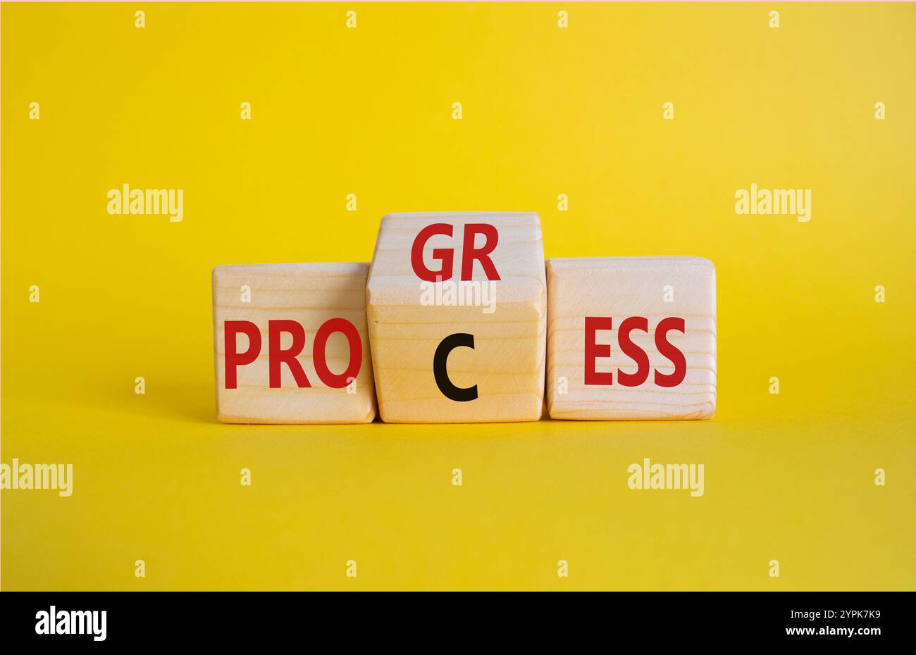 Process and Progress symbol. Wooden cubes with words Process and ...
