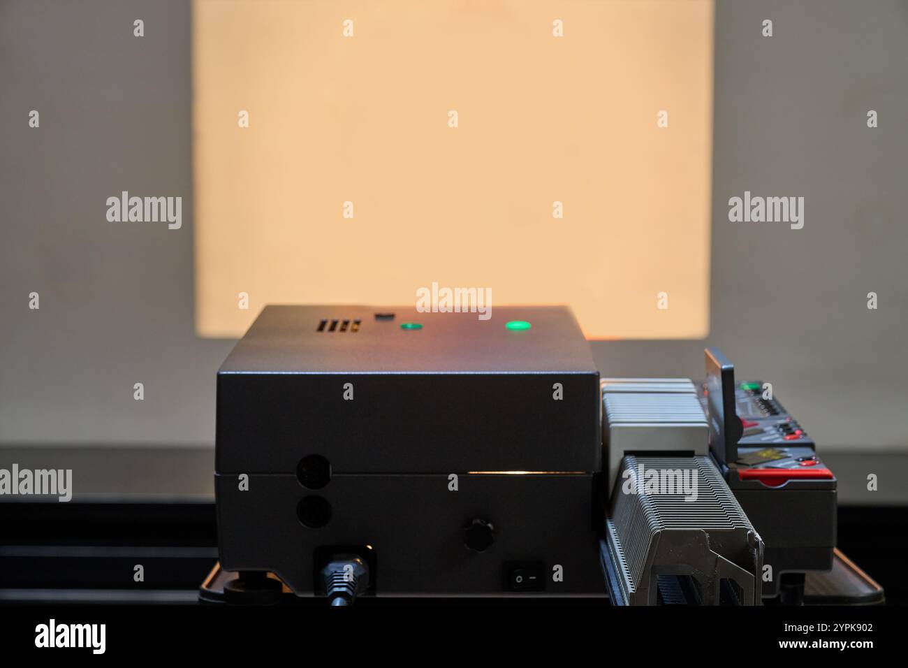 Dual slide projector in use with white blank picture on wall Stock ...