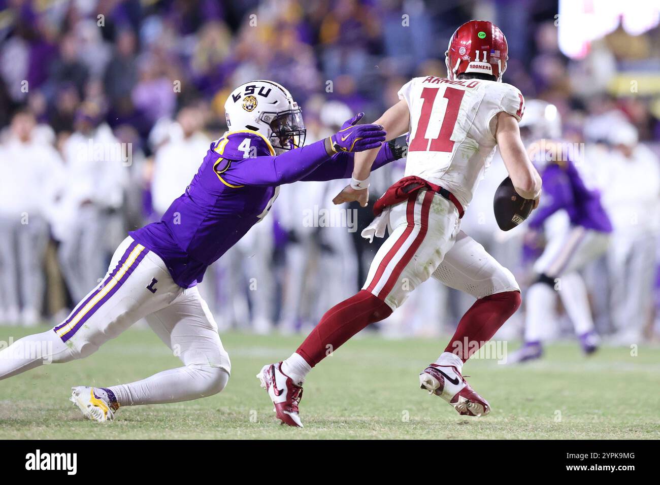 LSU Tigers defensive end Bradyn Swinson (4) closes in on Oklahoma ...