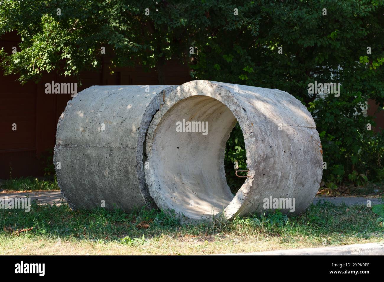 Two concrete rings lying in the street Stock Photo - Alamy