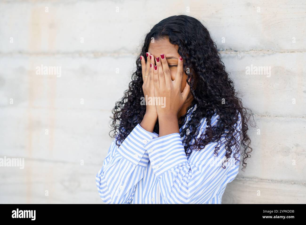 Woman hiding face tears hi-res stock photography and images - Alamy