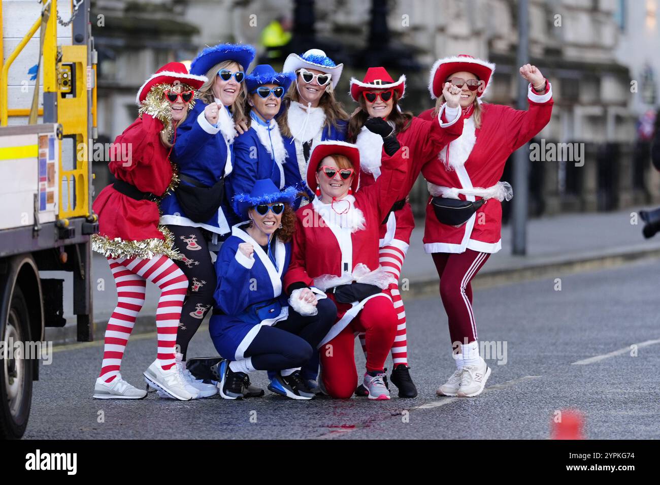 Some of more than 8,000 participants, known as Santas prepare to take ...