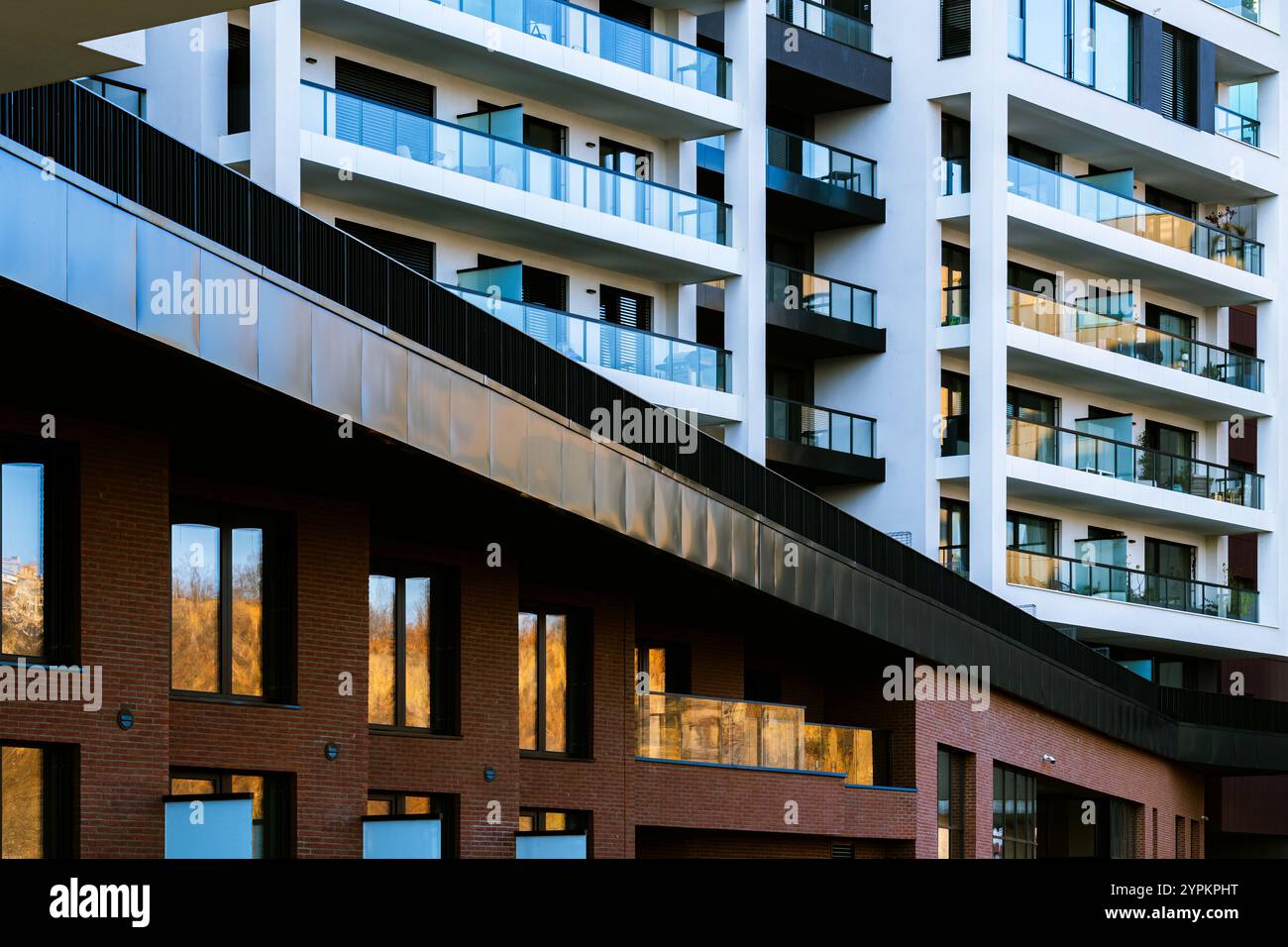 Contemporary Residential Buildings with Modern Balconies, Brick Facades ...