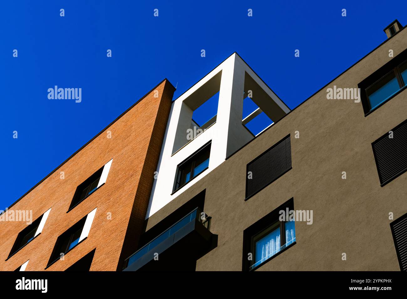 Contemporary Residential Buildings with Modern Balconies, Brick Facades ...