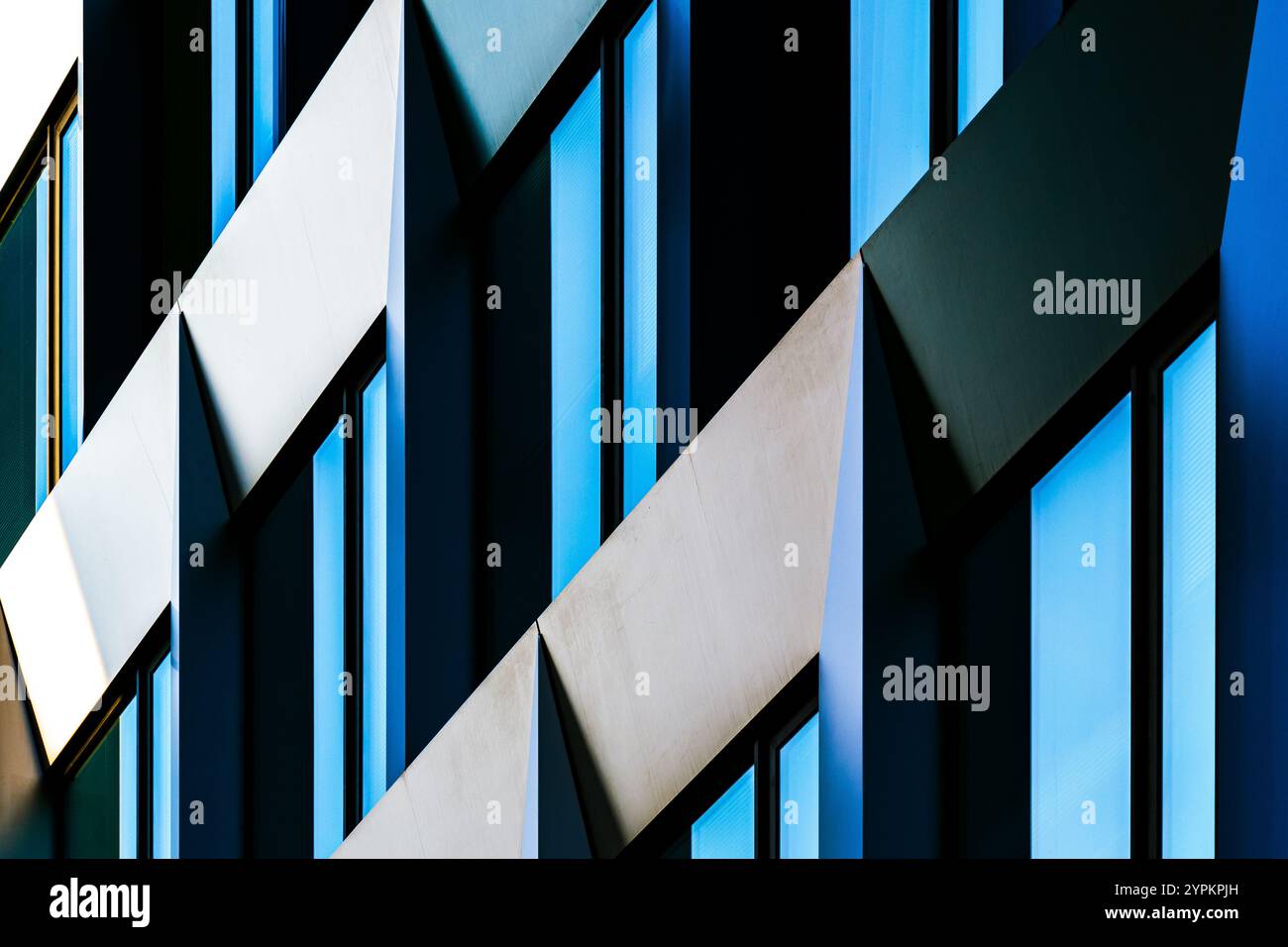 Abstract Close-Up of Modern Building Facade with Angular Patterns and ... Abstract Close-Up of Modern Building Facade with Angular Patterns and ...
