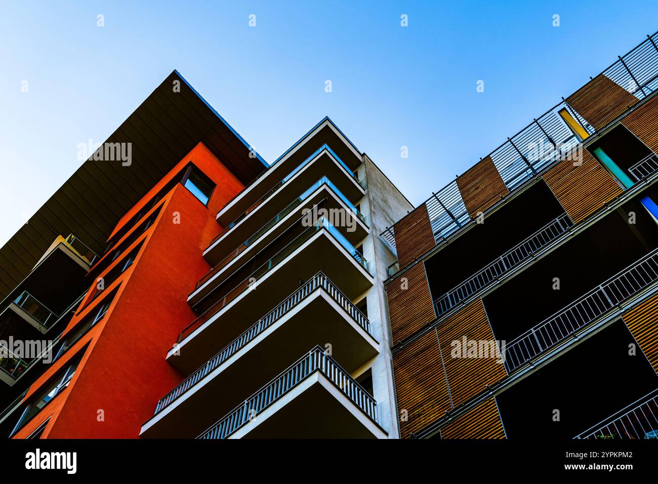 Contemporary Residential Buildings with Modern Balconies, Brick Facades ...
