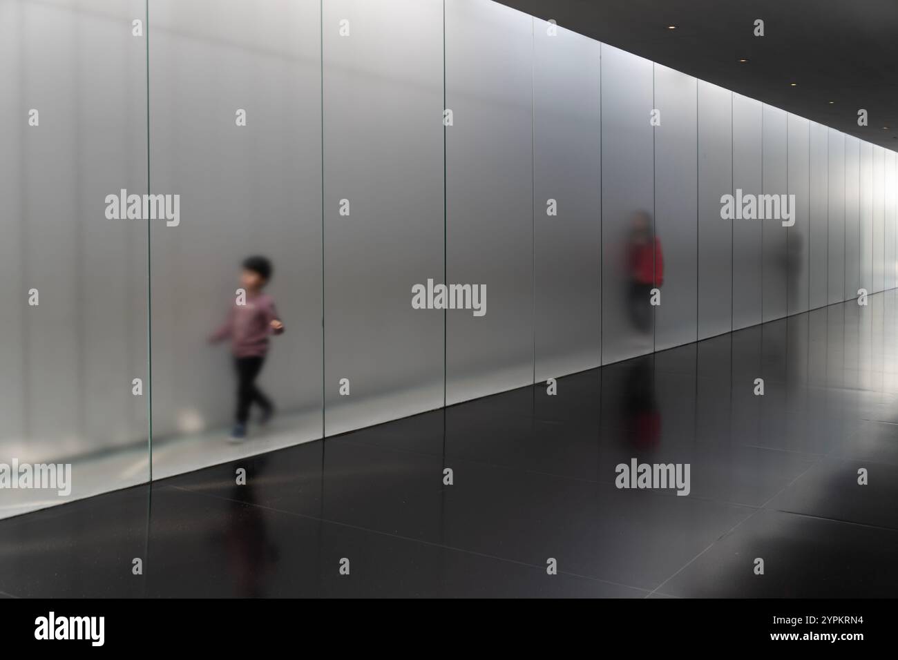 Visitors walk behind a transparent walkway in Israel Museum in West ...