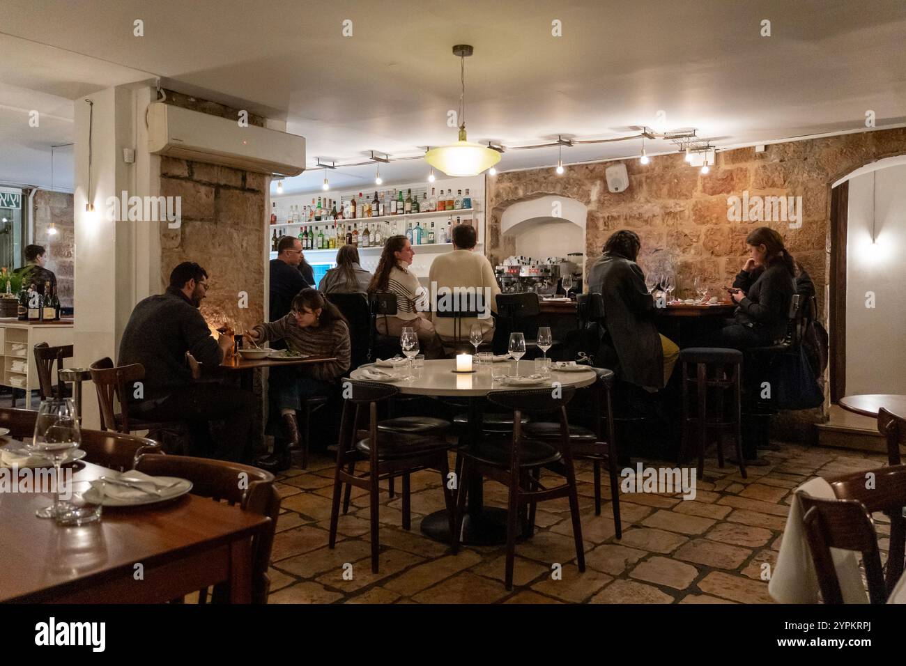 Israelis sit and eat in Mona fine dining restaurant at the Jerusalem ...