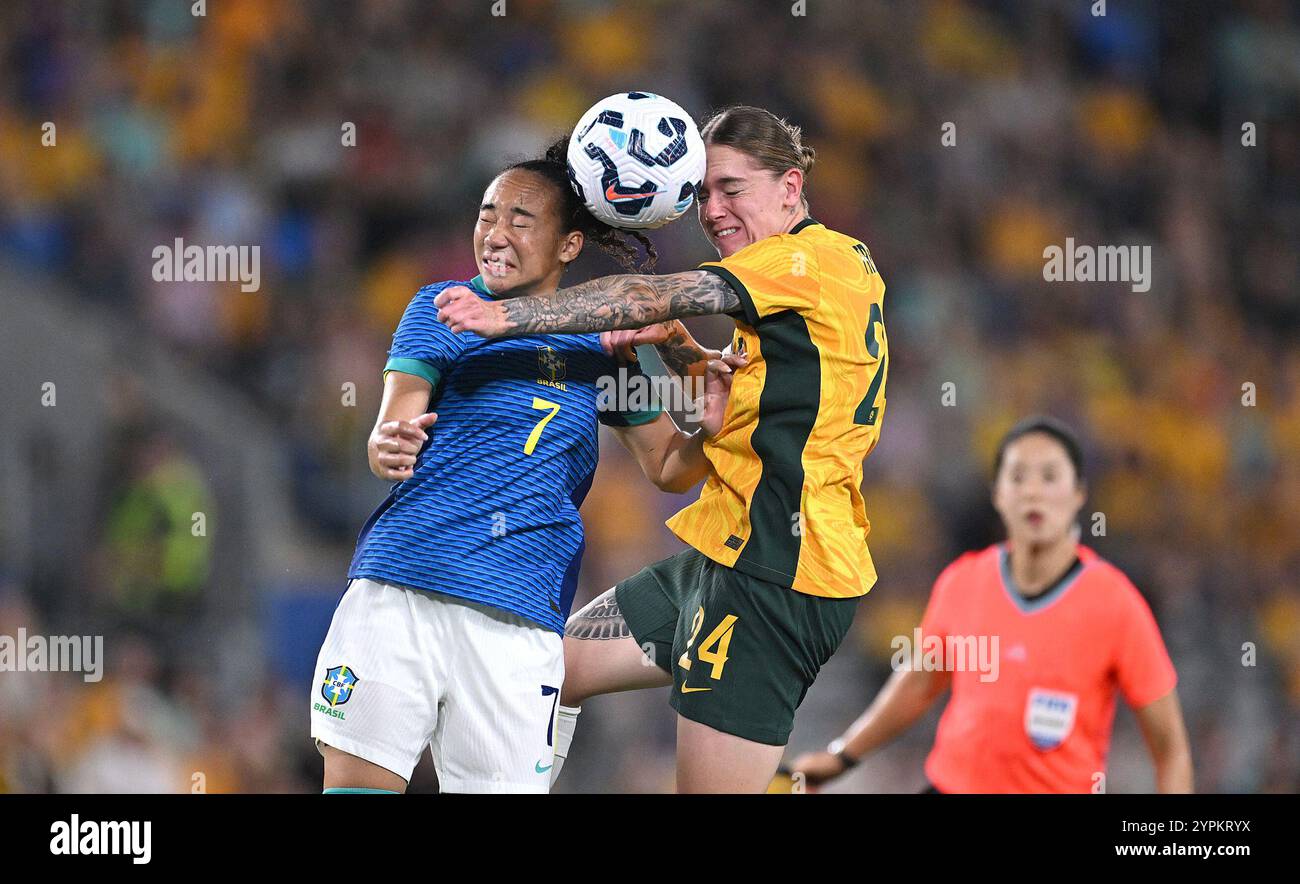 Aline Gomes Amaro of Brazil (left) competes with Sham Freier of the ...