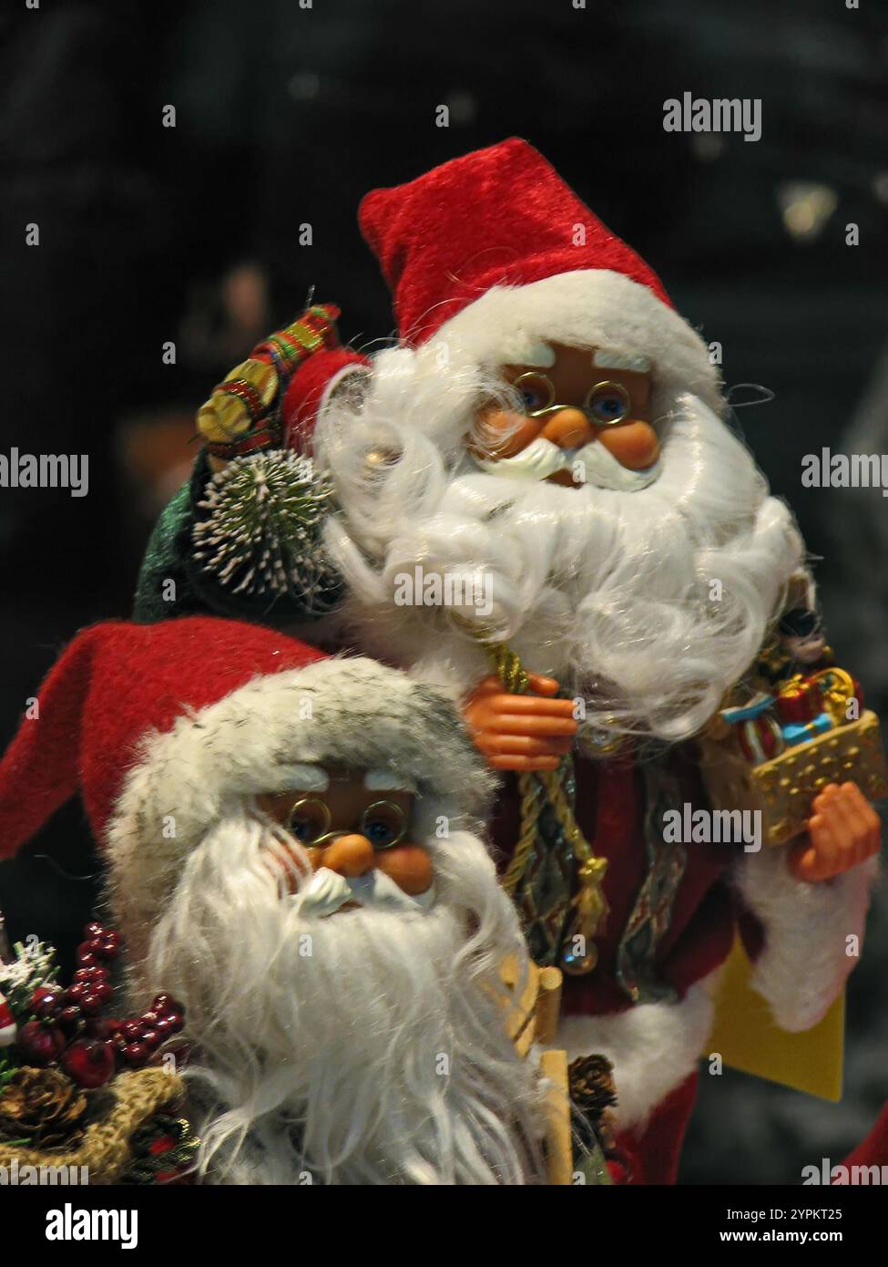 Artificial Santa Claus and one dwarf or midget go to give gifts to ...