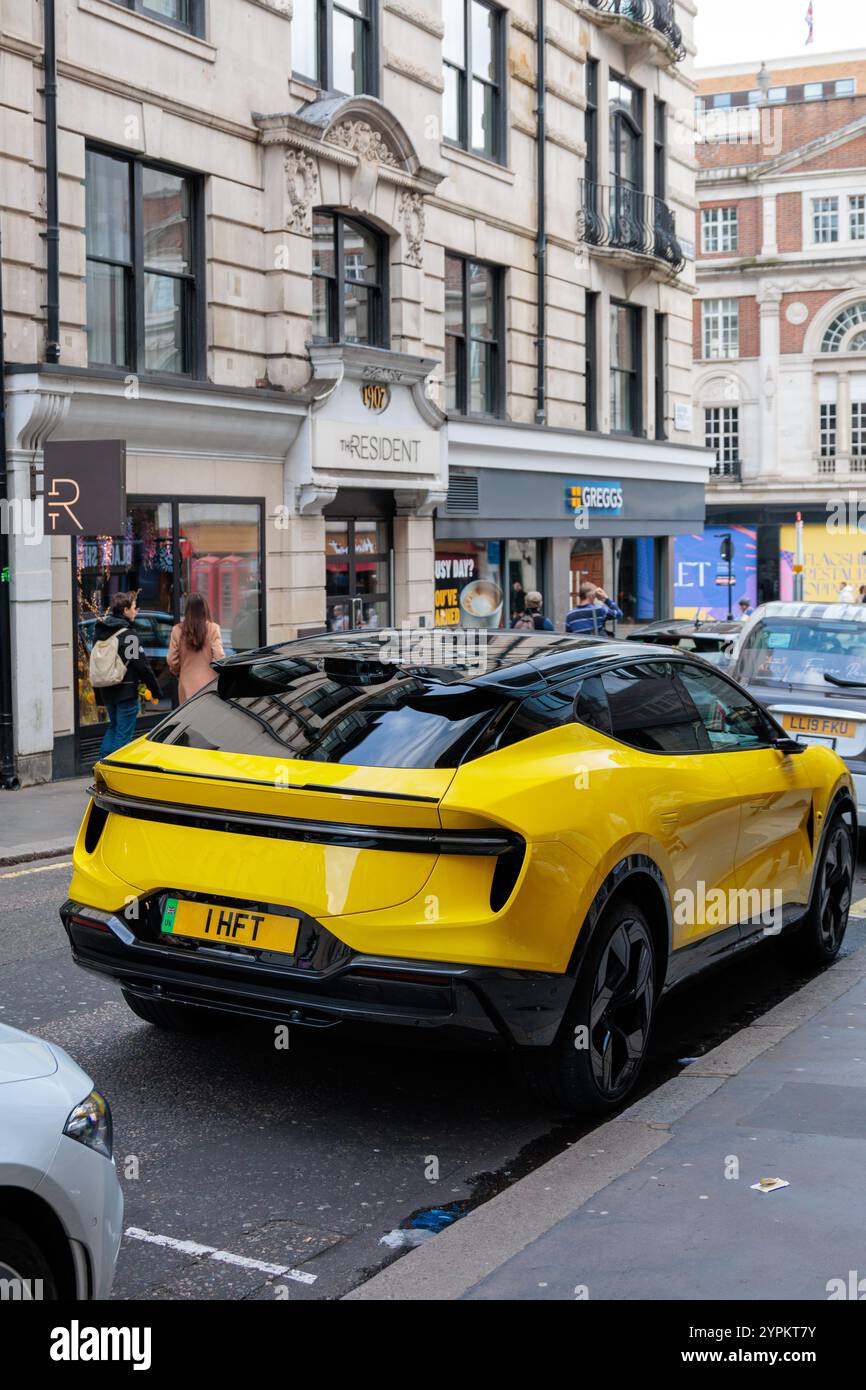 Yellow Lotus Eletre electric SUV parked in London street, showcasing ...