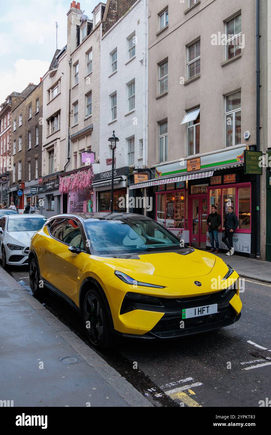 Yellow Lotus Eletre electric SUV parked in London street, showcasing ...