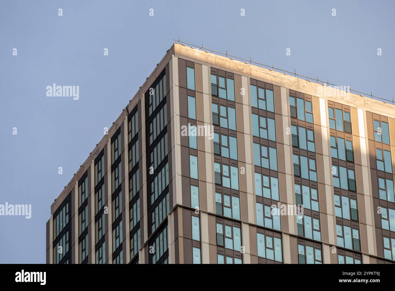 Modern apartment building facade in Canary Wharf featuring geometric ...