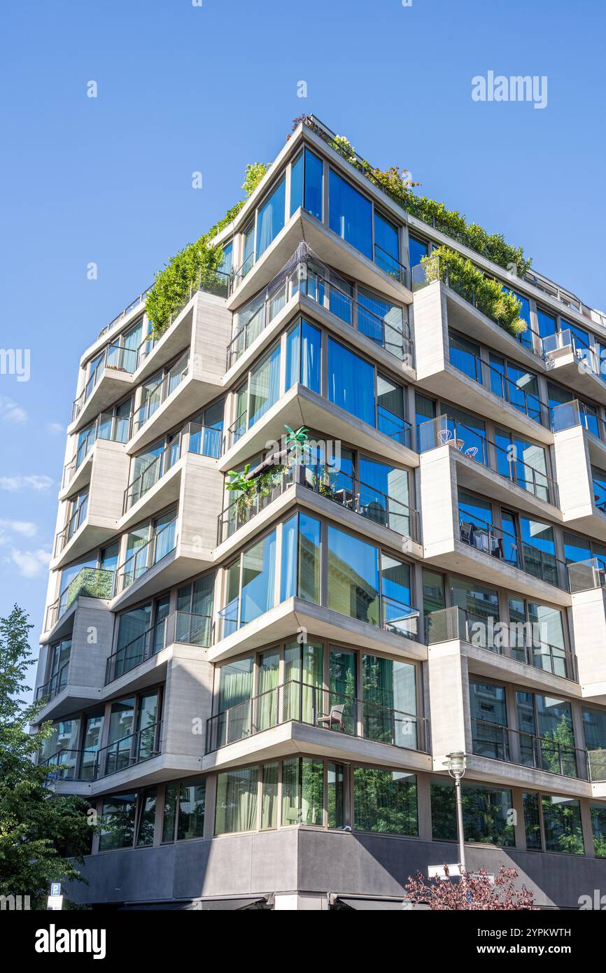 Modern apartment building with floor-to-ceiling windows seen in Berlin ...