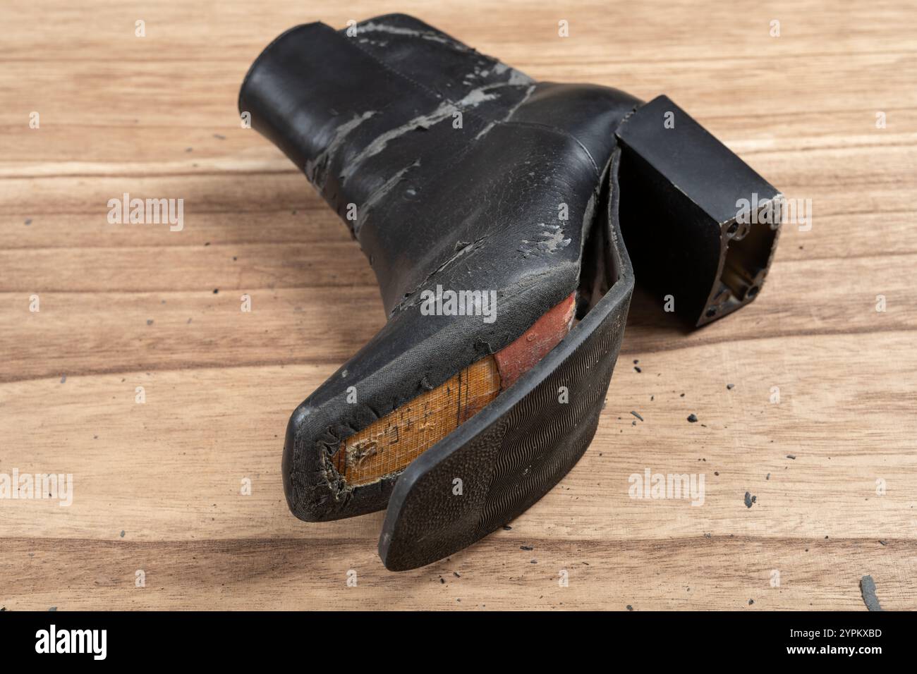 black broken high-heeled shoe for lady Stock Photo - Alamy