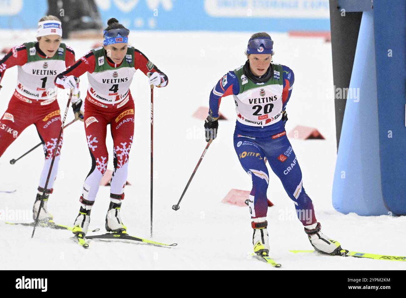 Therese Johaug (1) and Heidi Weng (4), both of Norway, and Flora Dolci ...