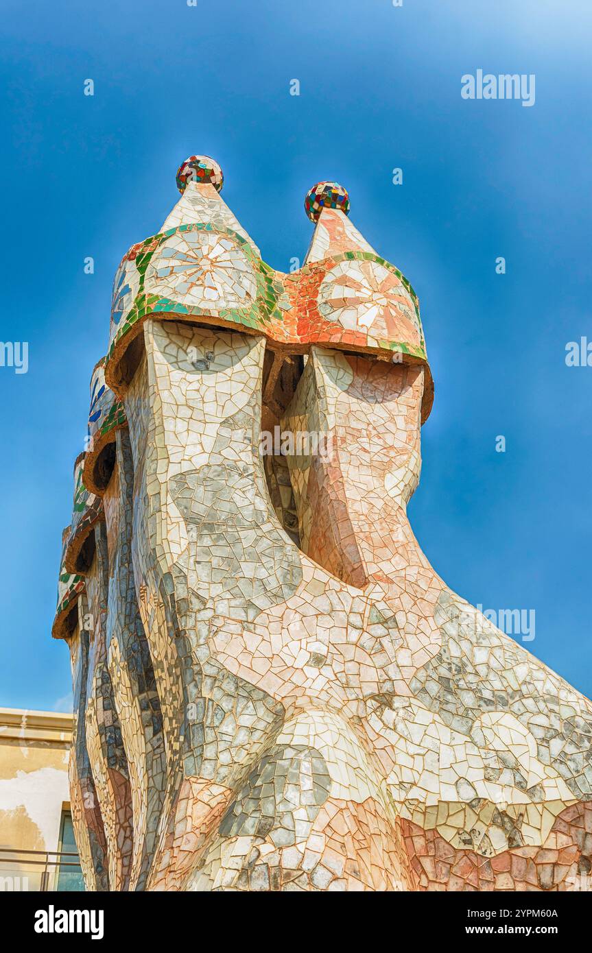 BARCELONA - AUGUST 9: Mosaic tile chimneys of Casa Batllo, renowned ...