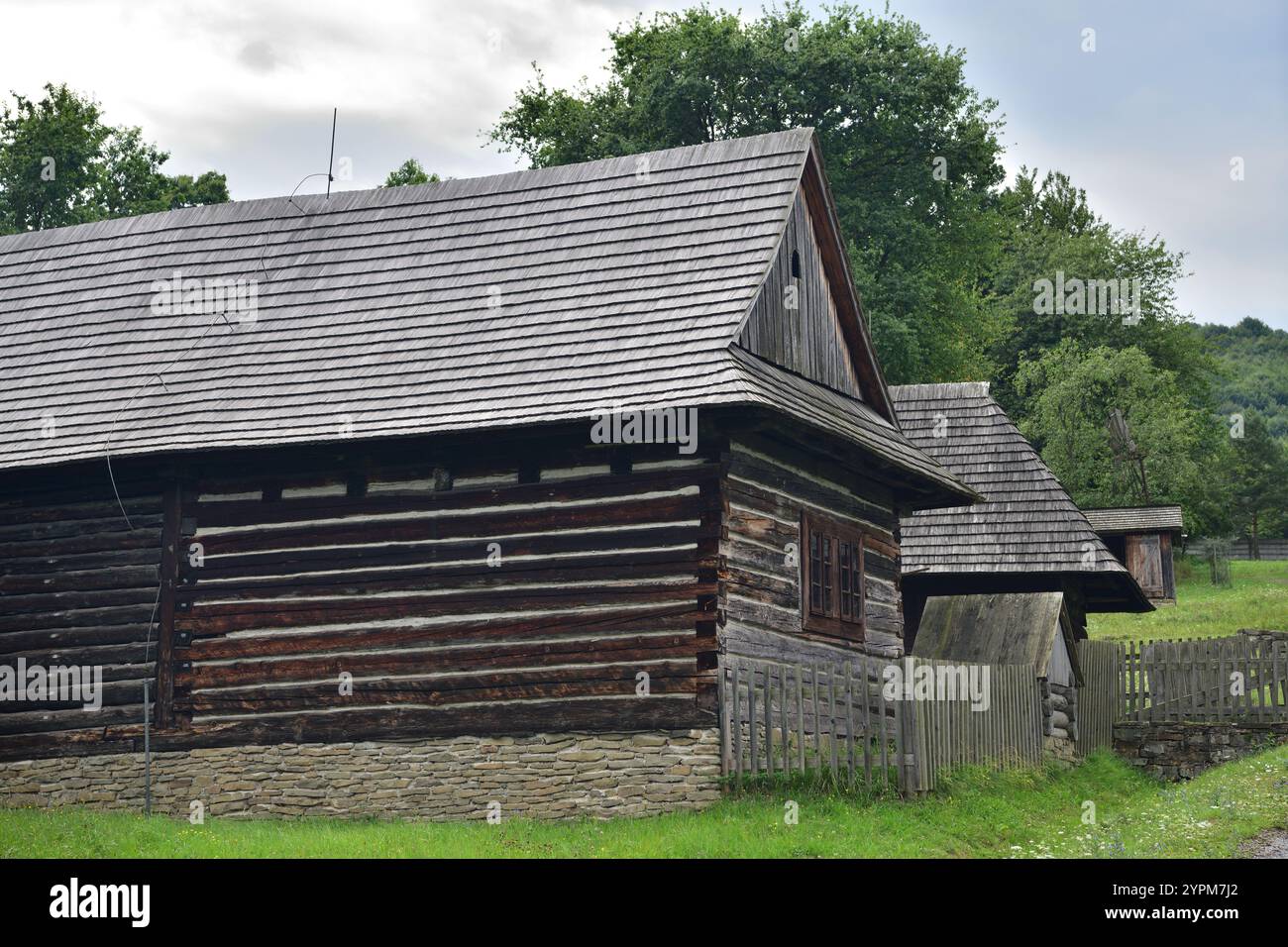 Wooden historic houses with roof from straw like the village in the ...